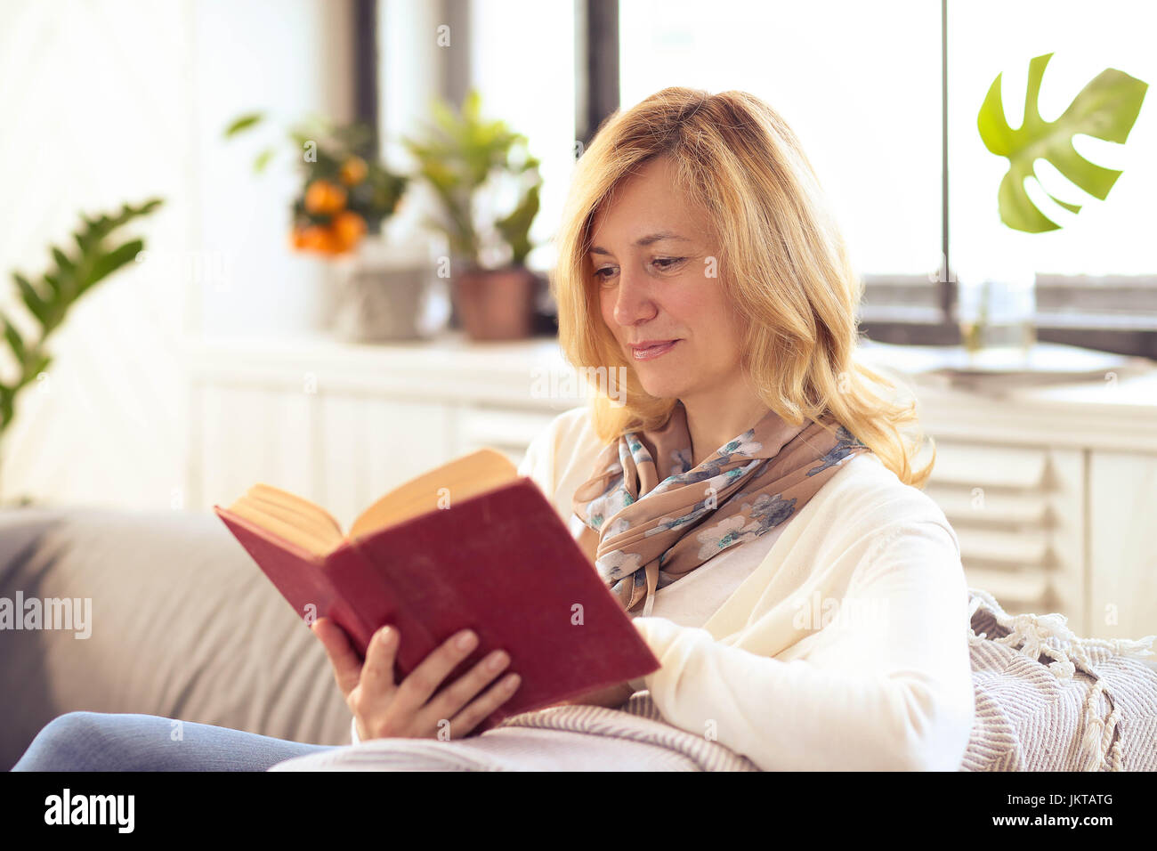 Woman at home Stock Photo - Alamy