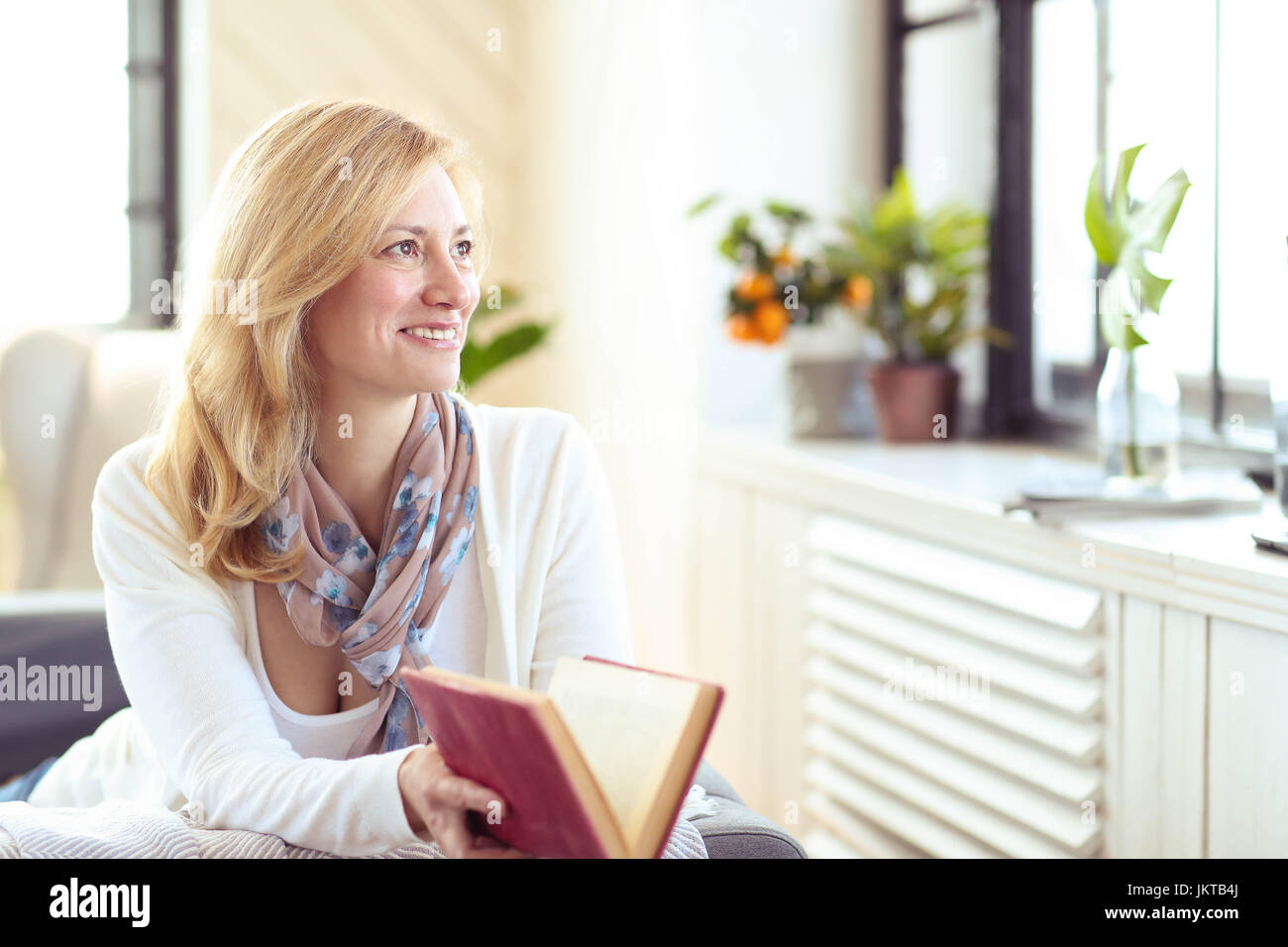Woman at home Stock Photo - Alamy