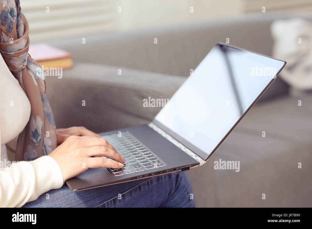 Woman with laptop Stock Photo - Alamy