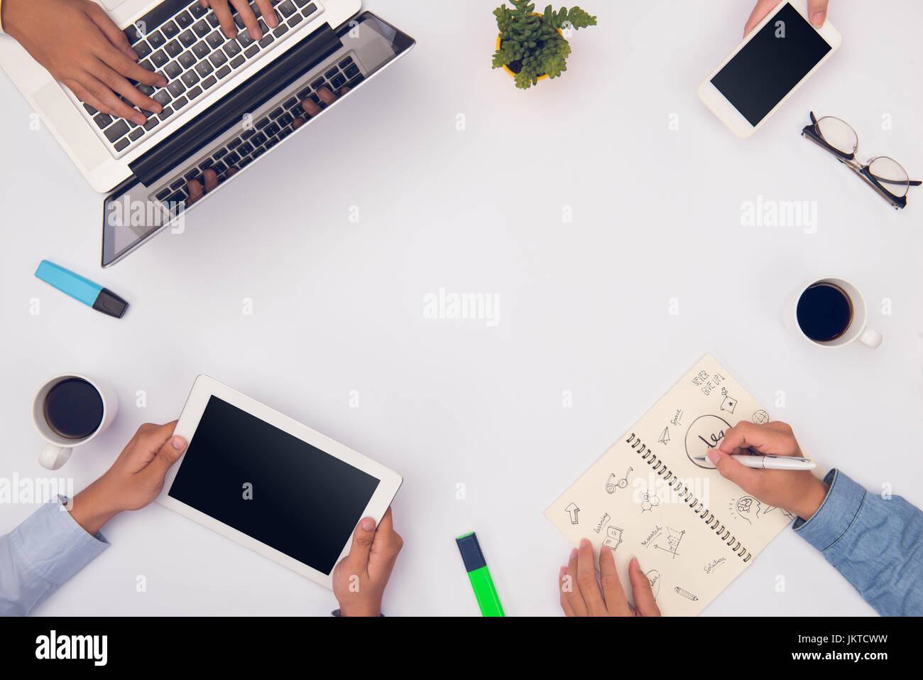 Workplace top view. Business partners discussing project Stock Photo ...