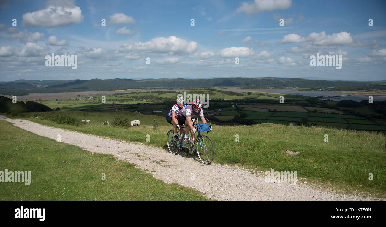 Couple Tandem Bike High Resolution Stock Photography and Images - Alamy