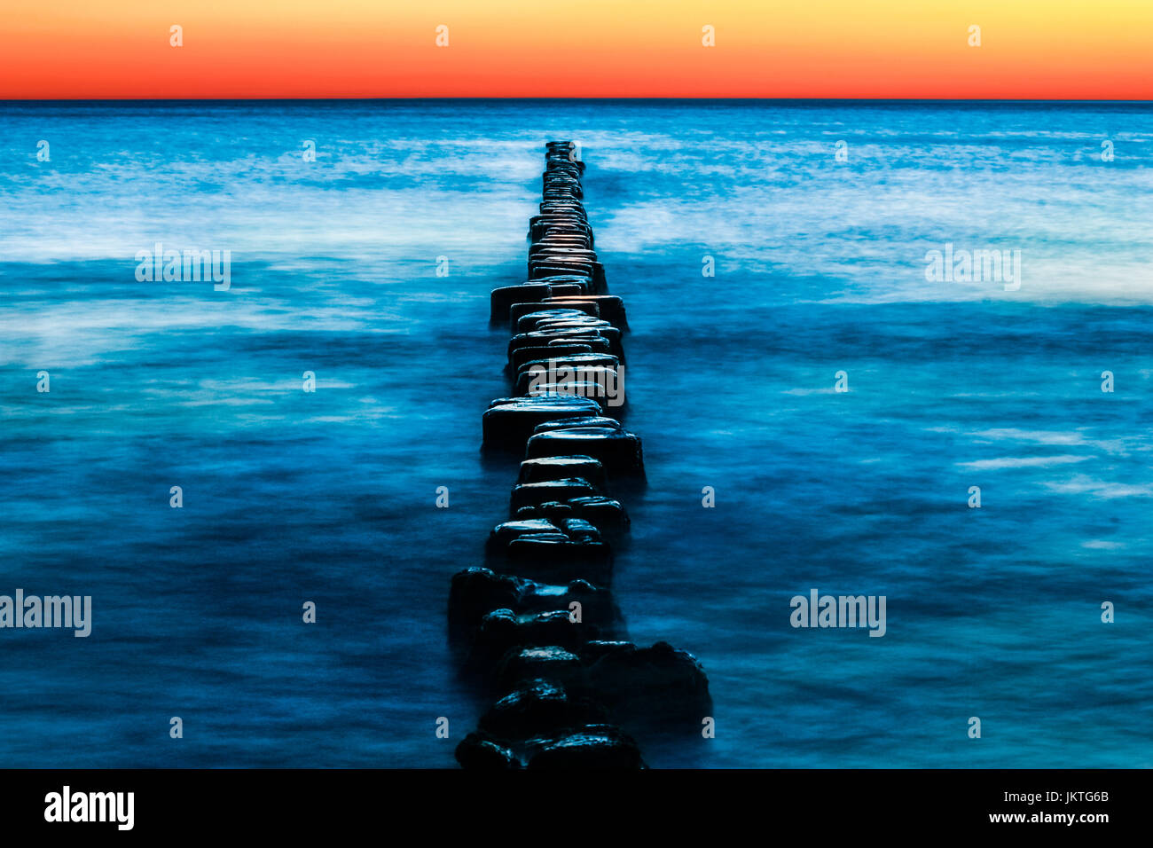 Rustic wooden groynes hi-res stock photography and images - Alamy