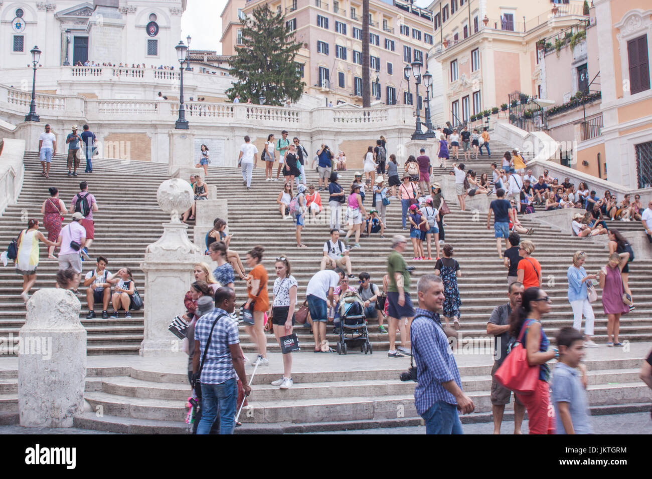Crowded group of tourists during the summer season in rome Stock Photo ...
