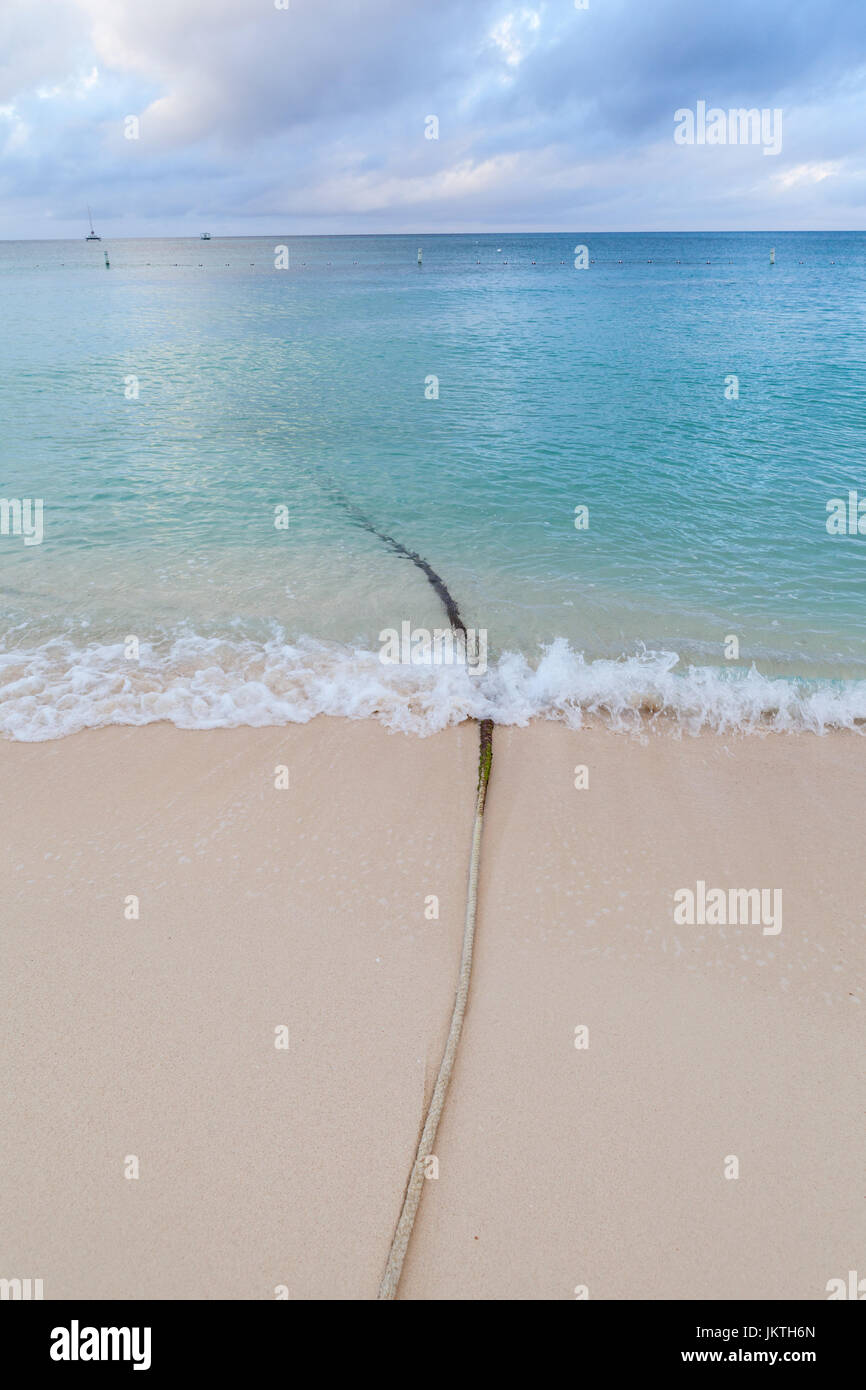 Rope from the buoy or raft on the beach blue ocean, Caribbean Sea Stock ...