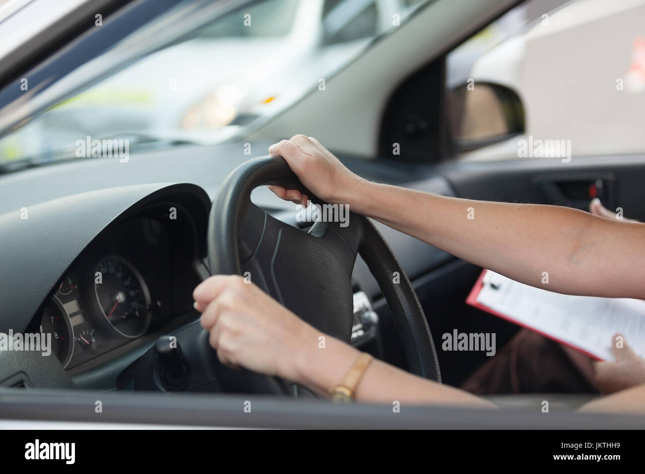 Learner driver student driving car with instructor Stock Photo - Alamy