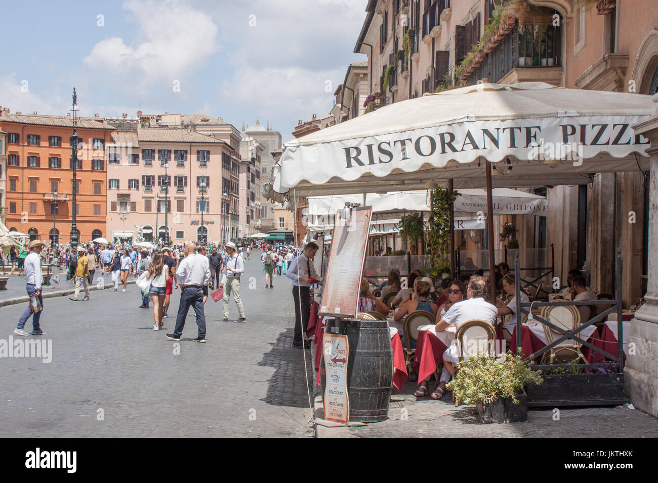 Crowded group of tourists during the summer season in rome Stock Photo ...