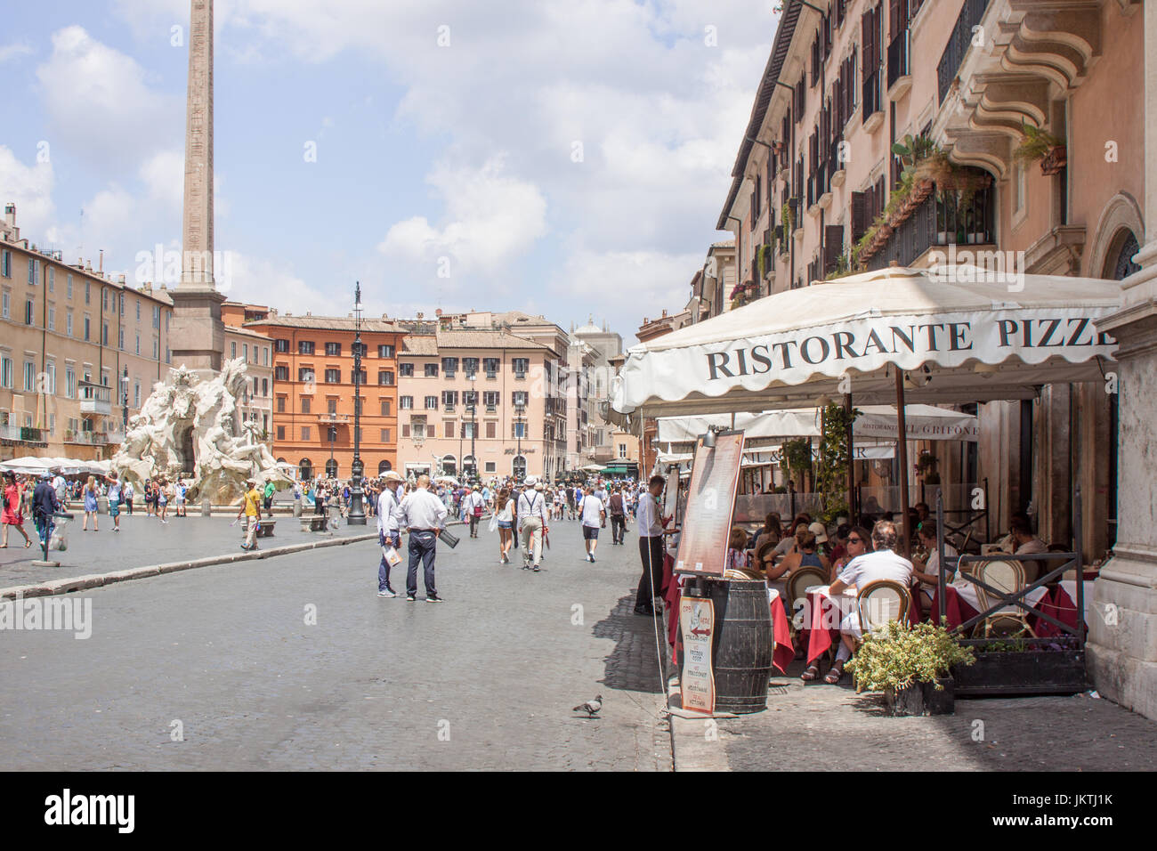 Crowded group of tourists during the summer season in rome Stock Photo ...