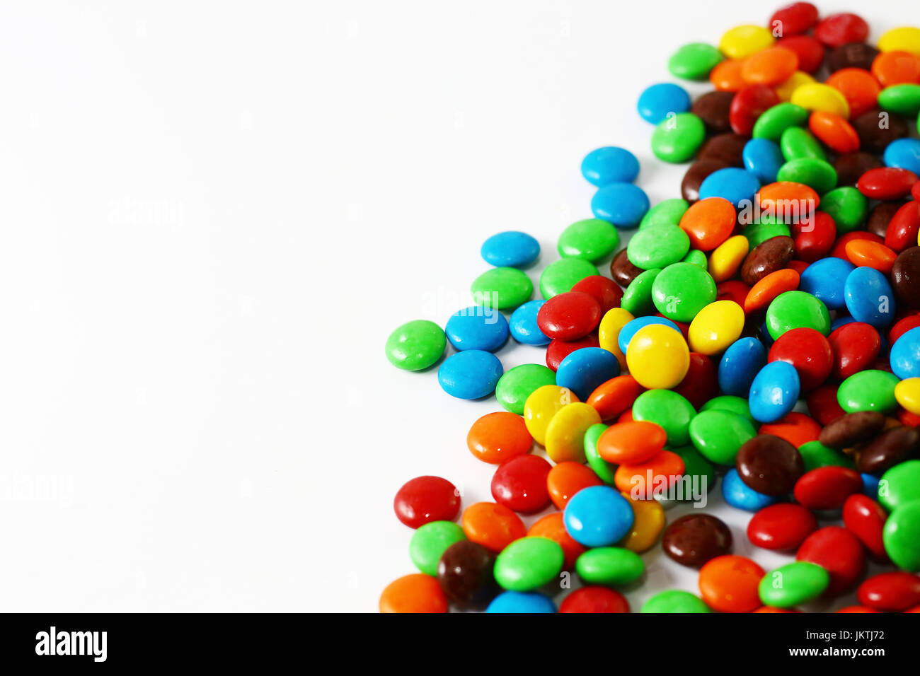 sweet color candy in white background with space Stock Photo - Alamy