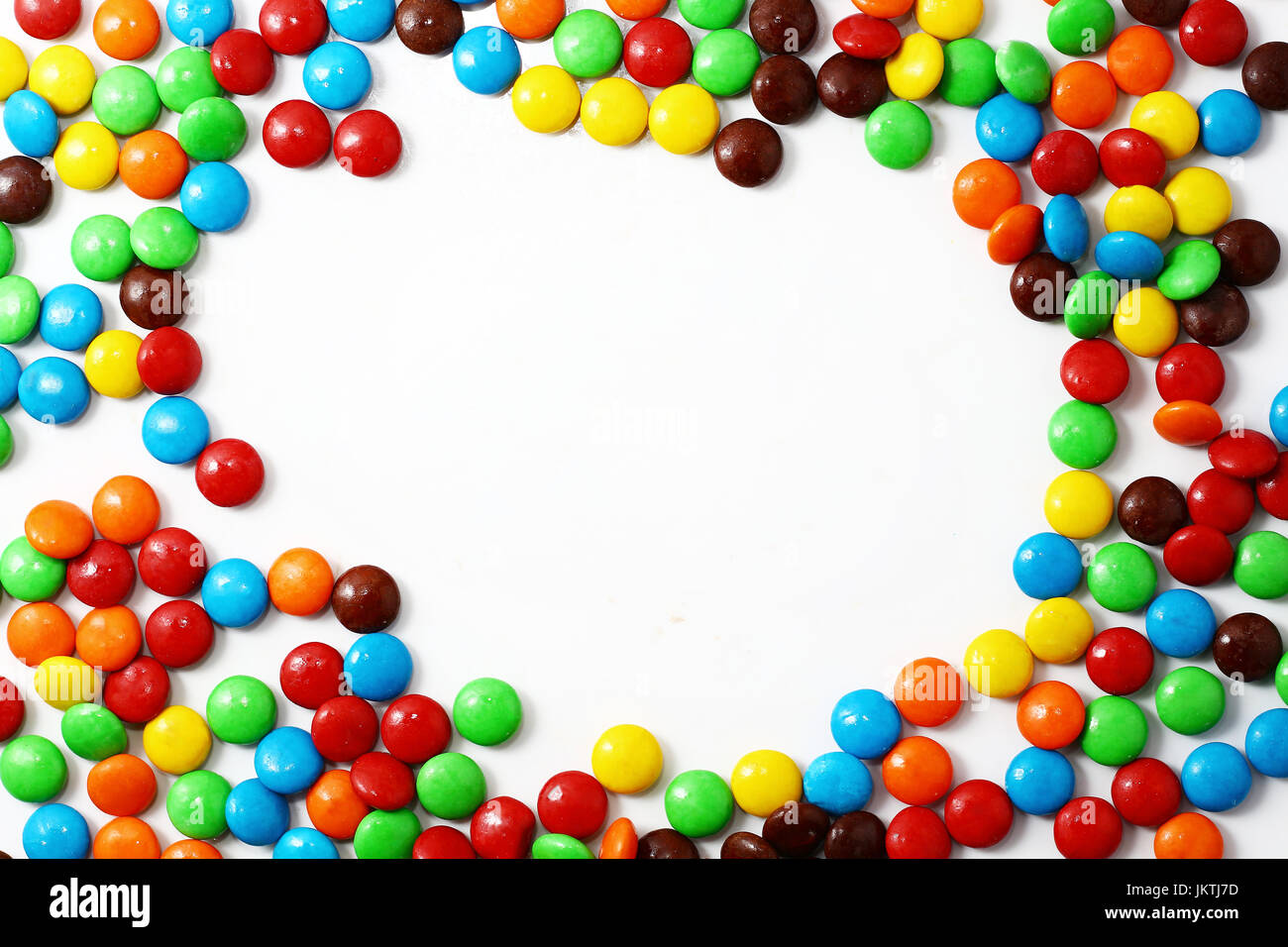 sweet color candy in white background with space Stock Photo - Alamy