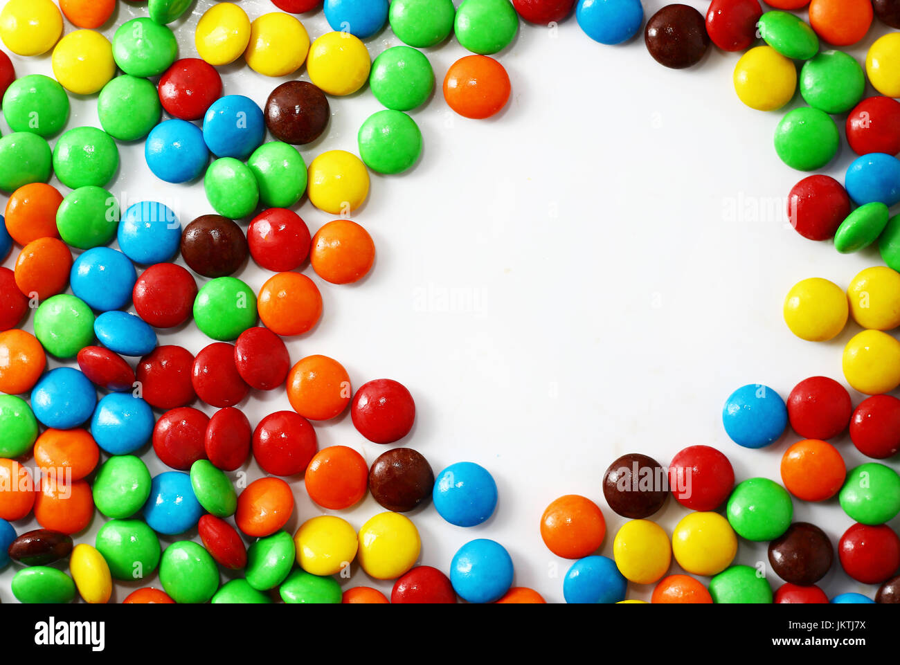 sweet color candy in white background with space Stock Photo - Alamy