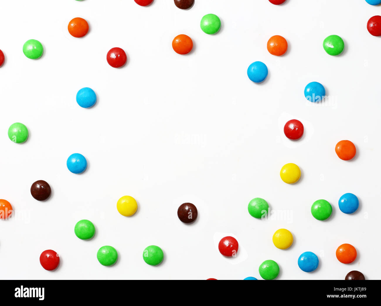 sweet color candy in white background with space Stock Photo - Alamy
