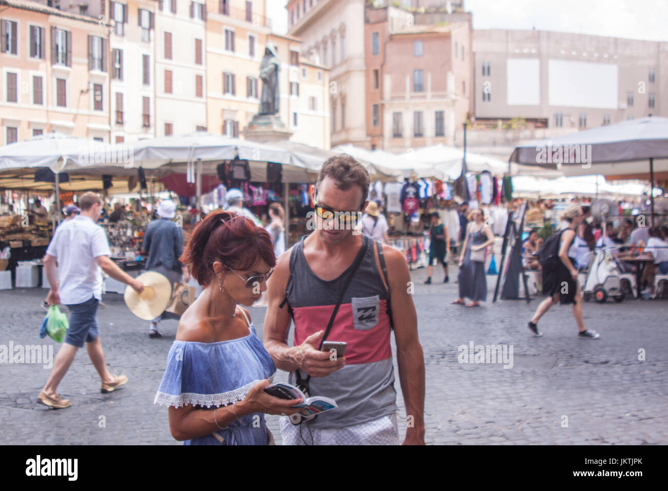 Crowded group of tourists during the summer season in rome Stock Photo ...
