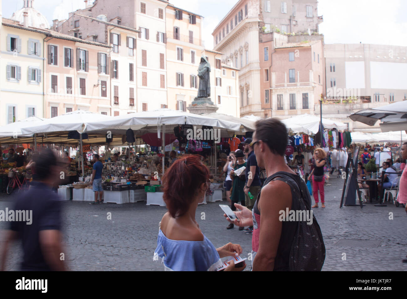 Crowded group of tourists during the summer season in rome Stock Photo ...