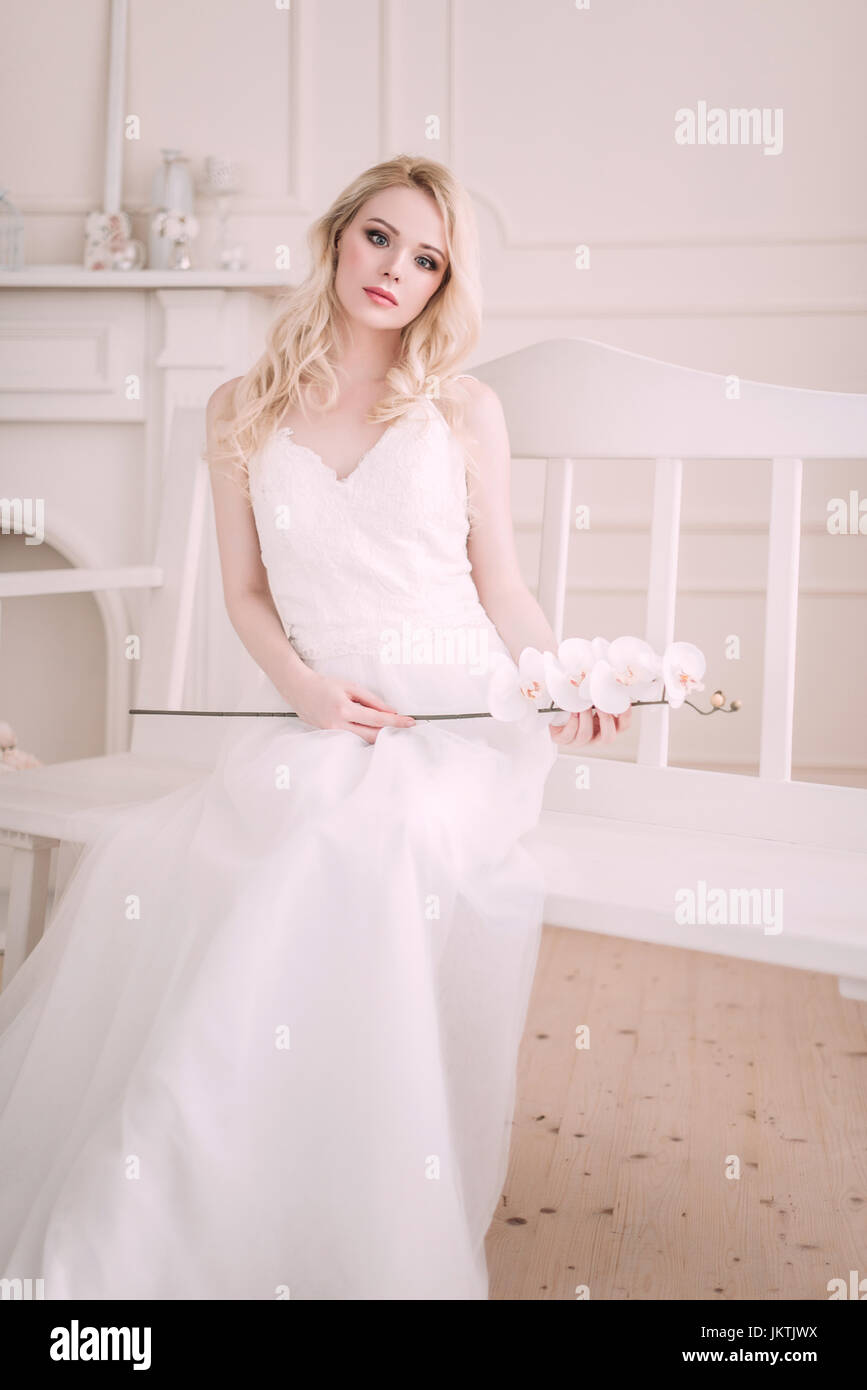 Portrait of a beautiful blond girl in image of the bride . Beauty face ...