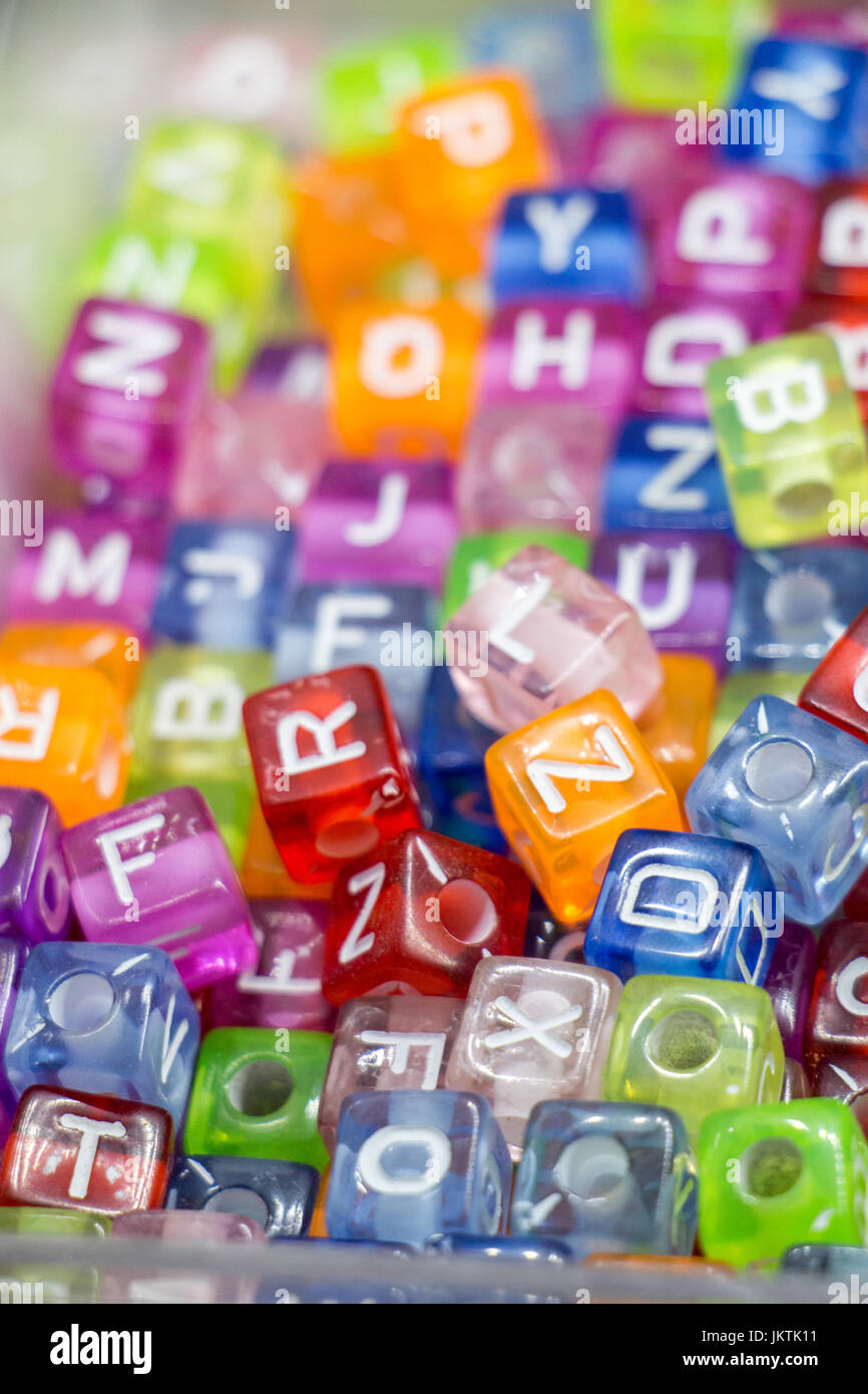Colorful alphabet letter cubes in view Stock Photo - Alamy