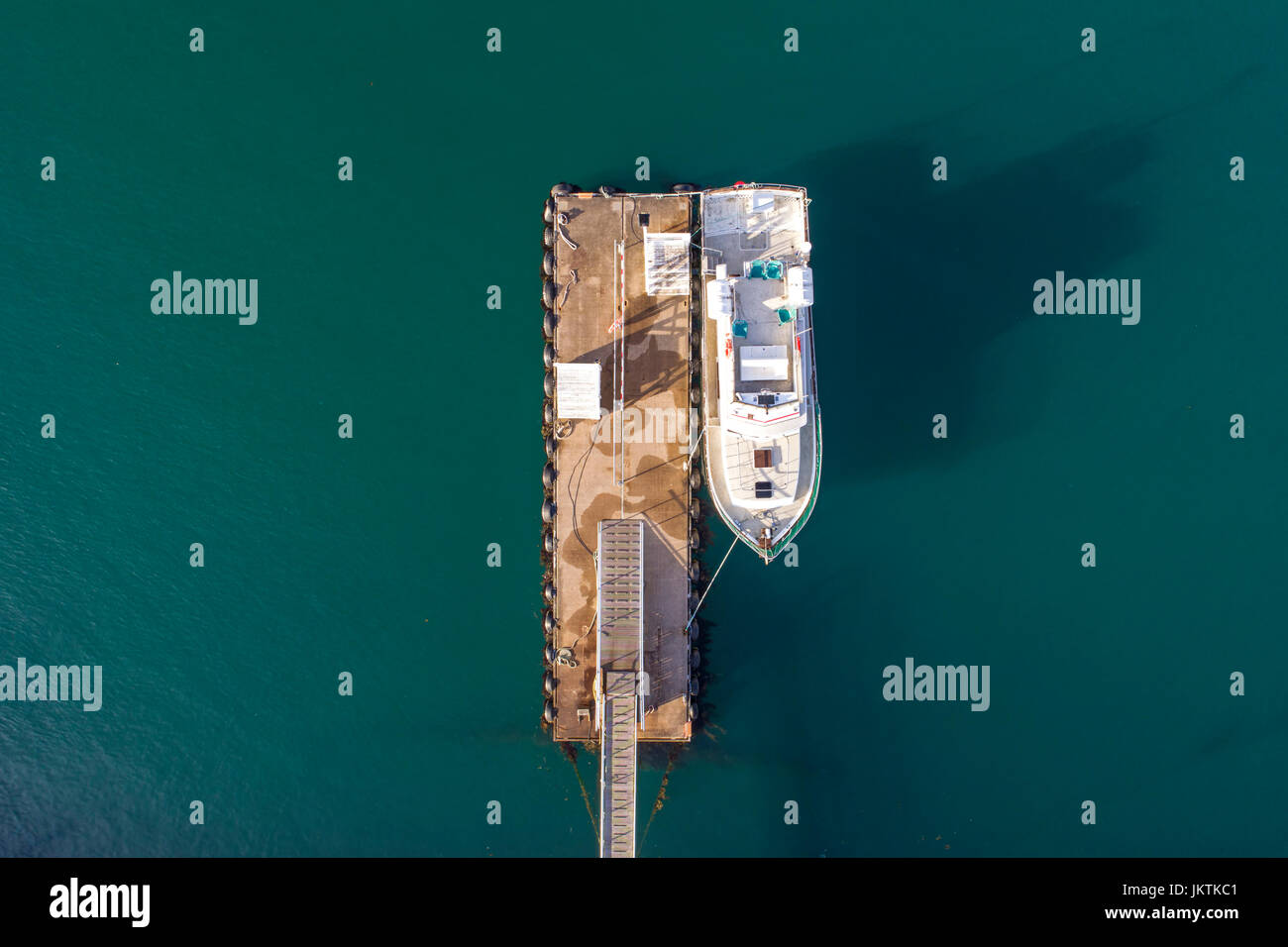 Aerial image of a boat at a floating dock in the summer Stock Photo - Alamy