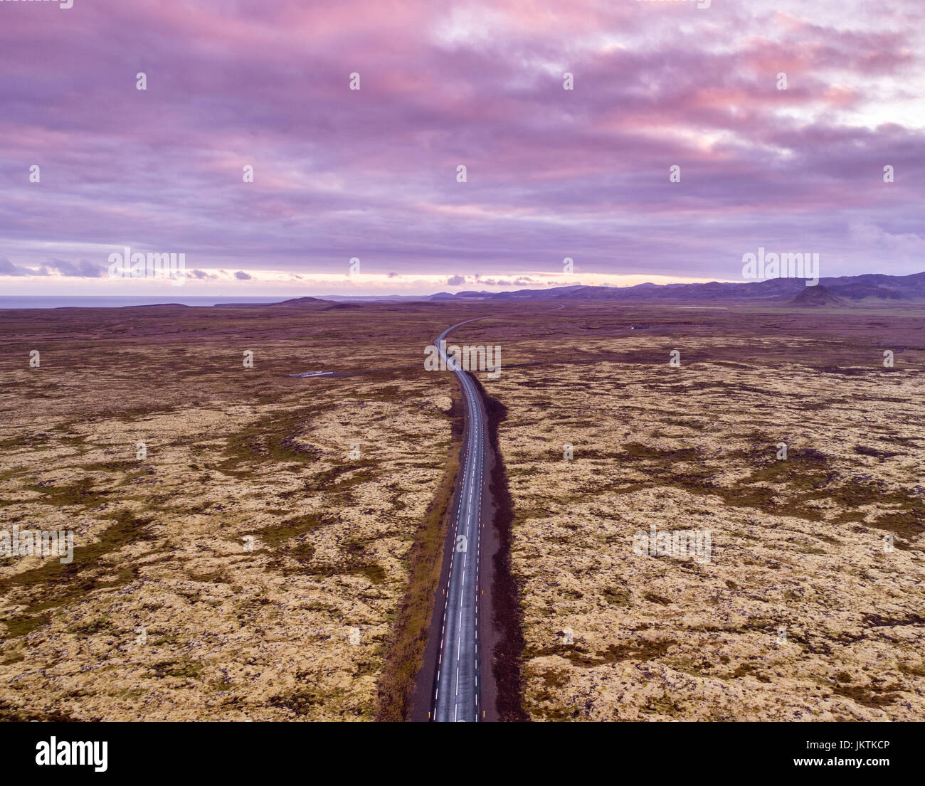 Desolate road going through volcanic landscape in Iceland Stock Photo ...