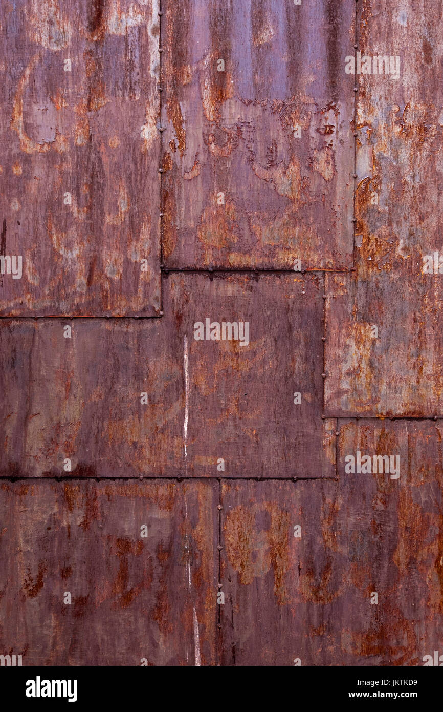Old and rusty metal plate rivetsbackground Stock Photo - Alamy