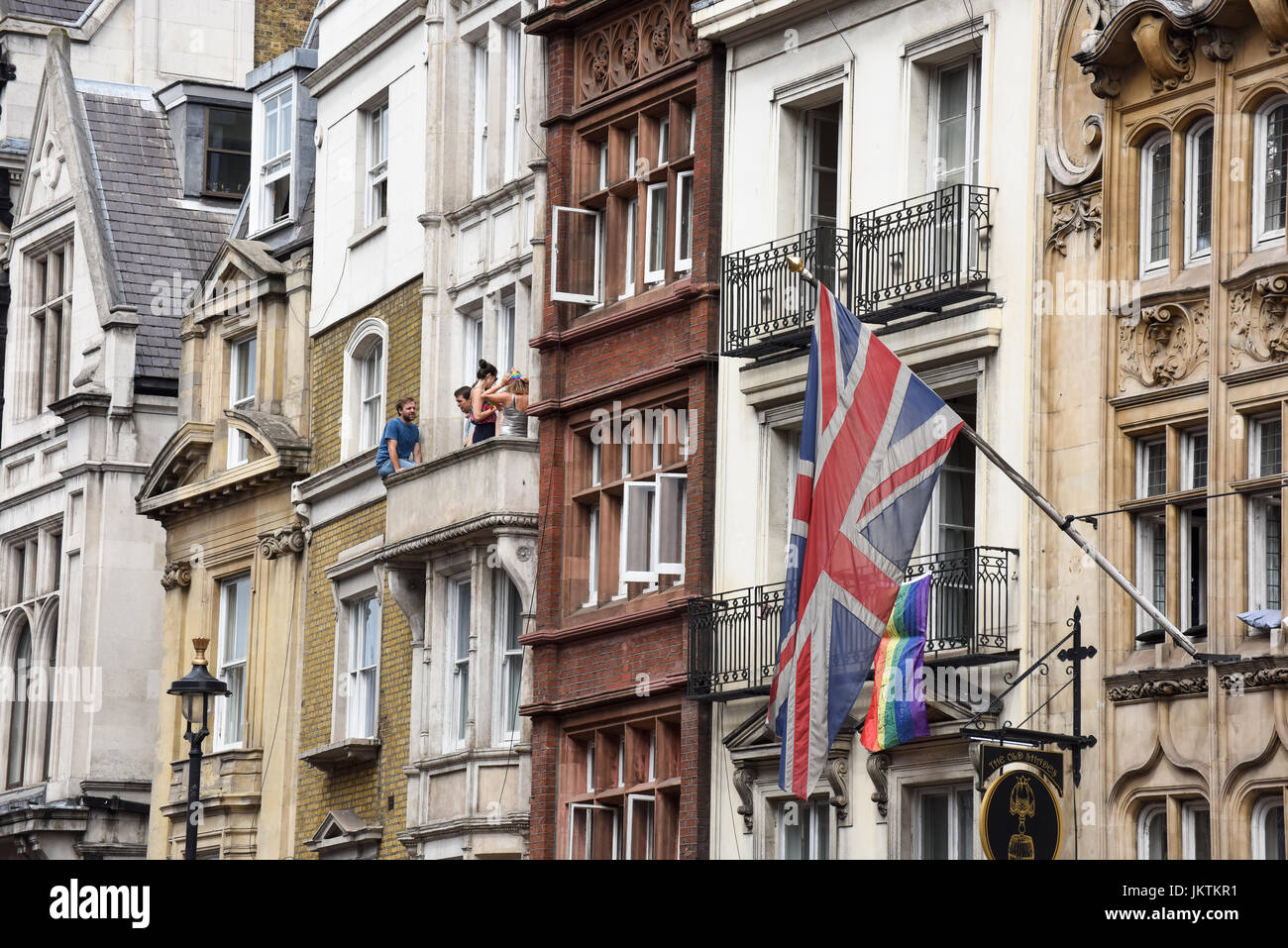 Pride in London, 2017. Union Jack flag and rainbow flag are hanging on ...