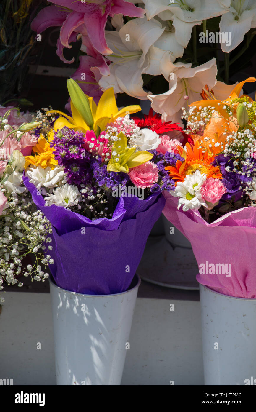 Beautiful flowers of various types in a flower in vase Stock Photo - Alamy