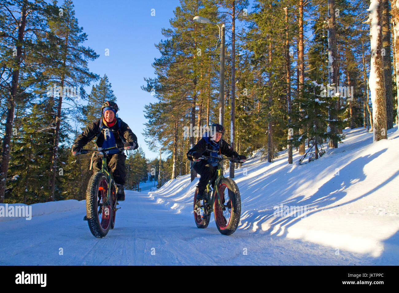 Fat biking at the Finland ski resort of Ruka Stock Photo - Alamy