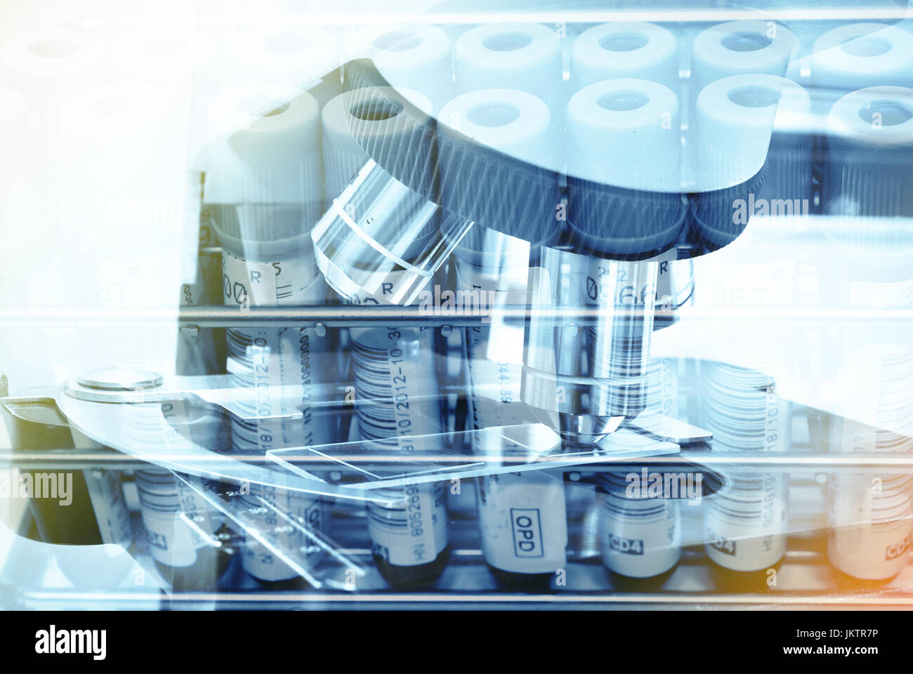 Researcher studying chemical element in hi-res stock photography and ...