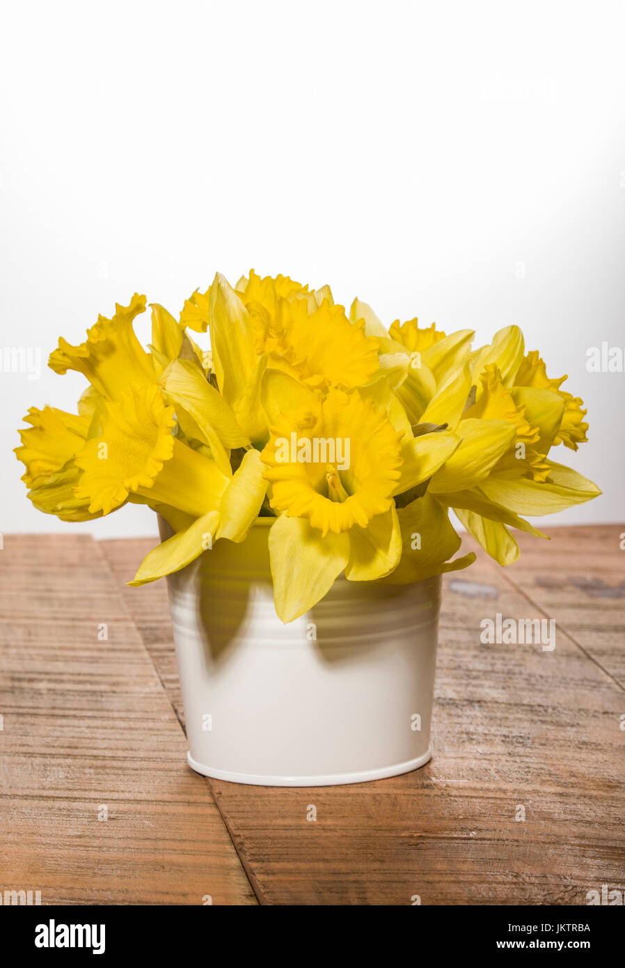 Yellow flowers in bucket hi-res stock photography and images - Alamy