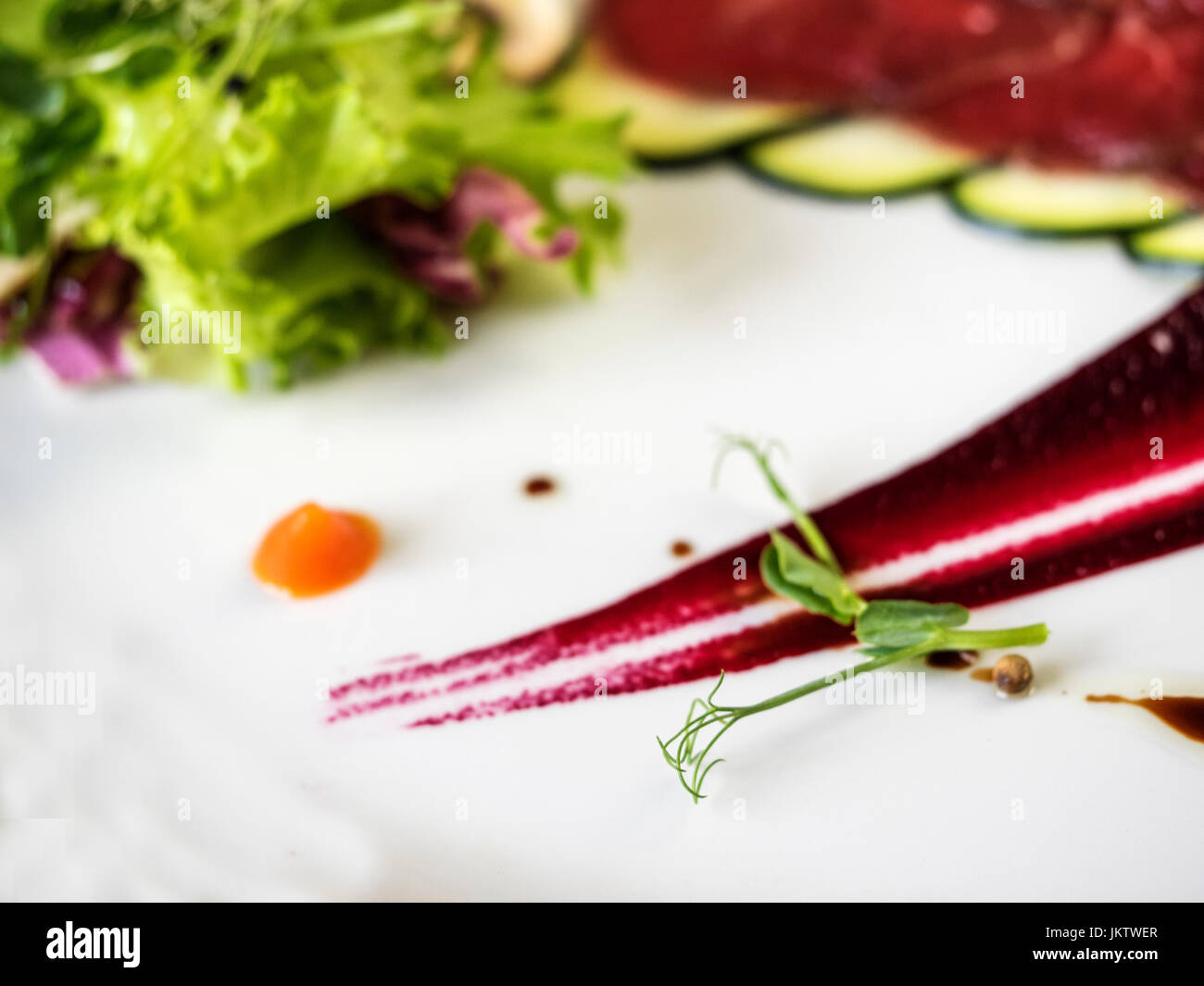 Meat Carpaccio with Salad from fresh vegetables. Selective focus Stock ...