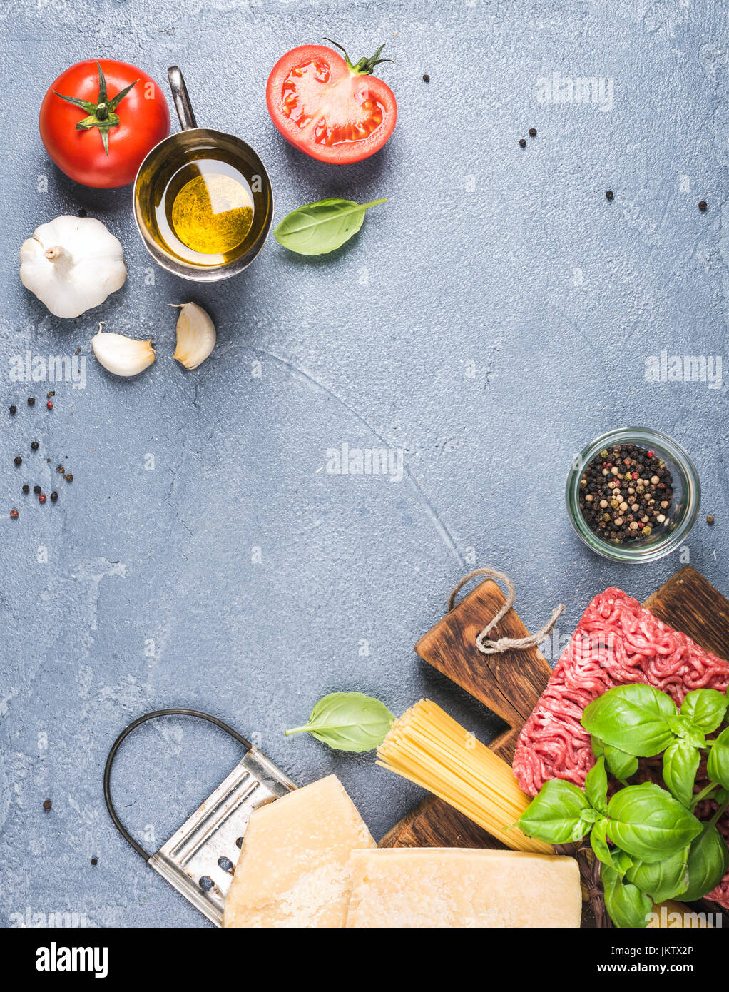 Ingredients for cooking pasta Bolognese. Spaghetti, Parmesan cheese ...