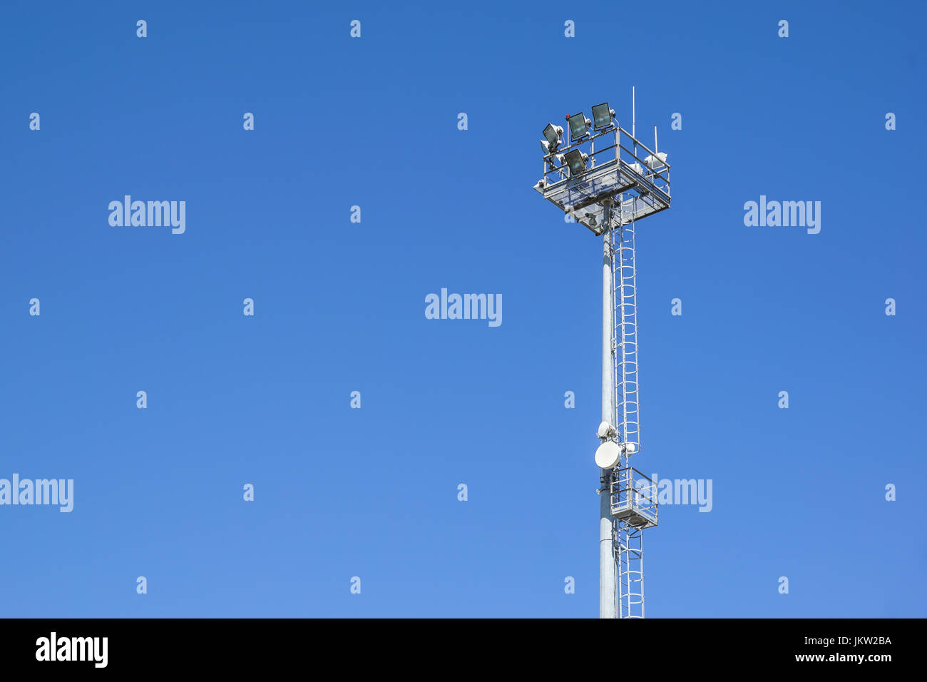 light pole tower on blue sky .Stadium Stock Photo - Alamy