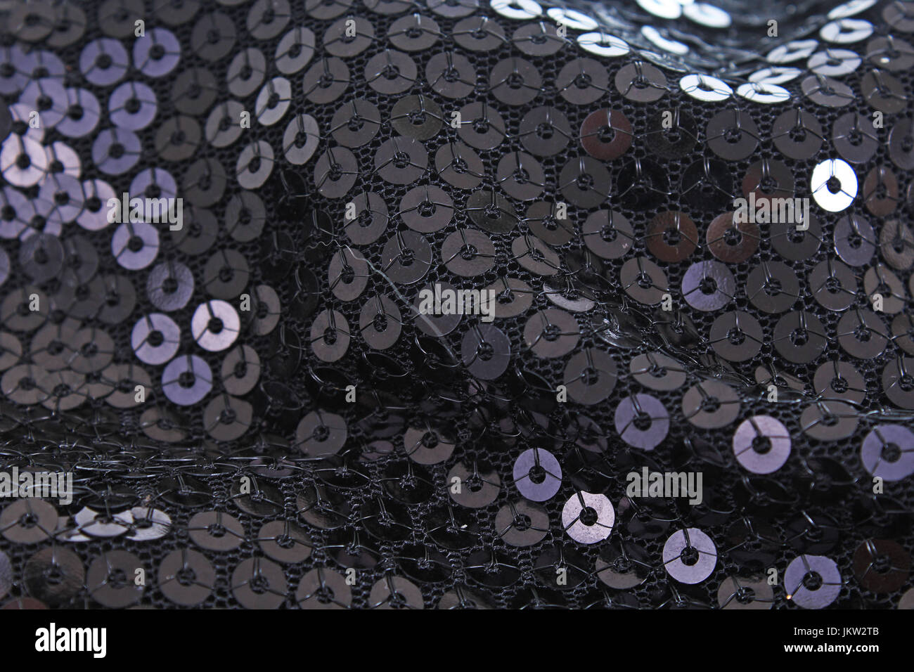 Black sequin texture. Black sequins as background Stock Photo - Alamy