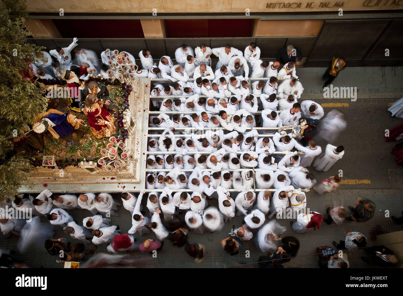 Members from the Prendimiento brotherhood carry the throne from the ...
