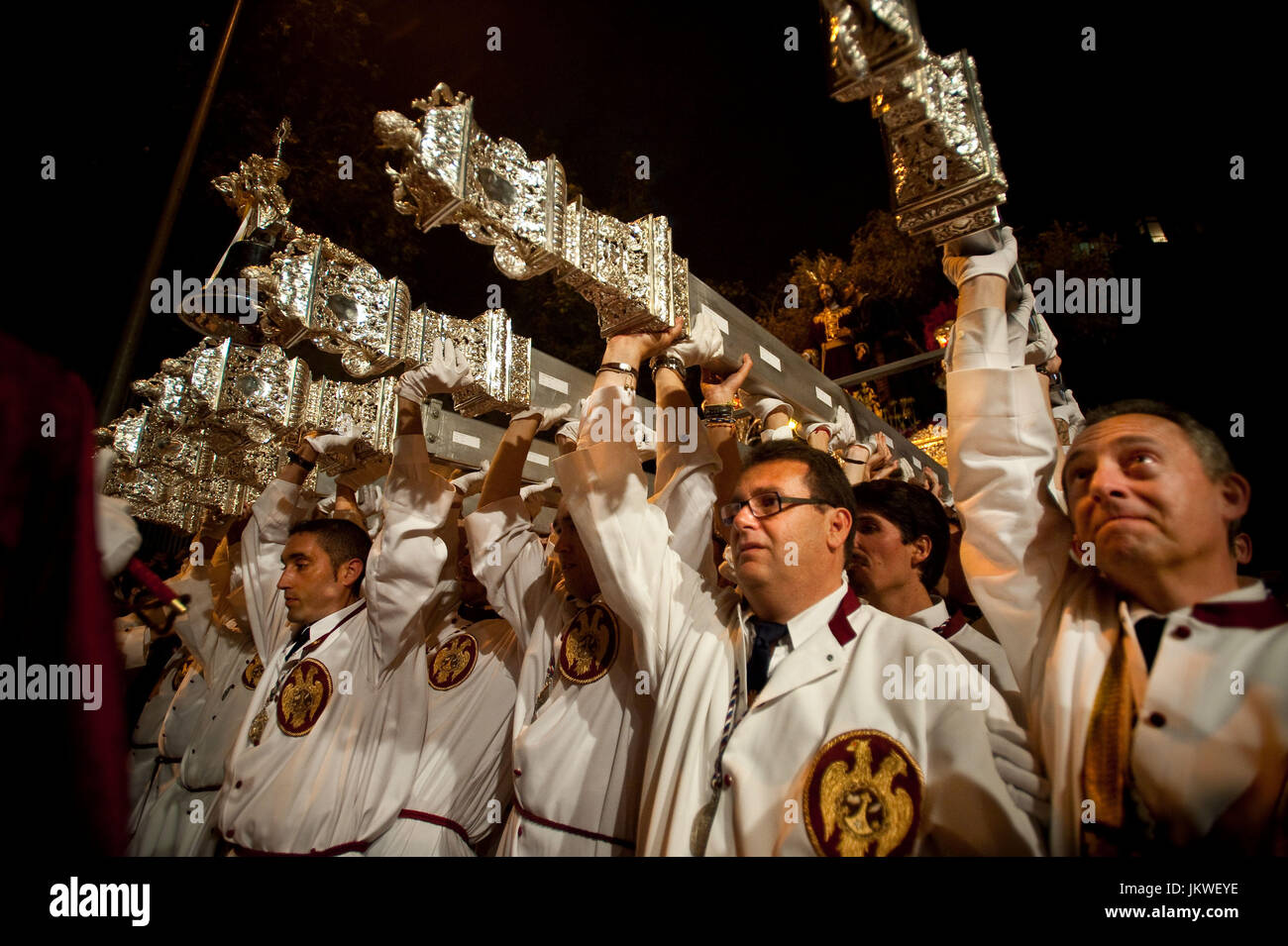 Members from the Prendimiento brotherhood carry the throne from the ...