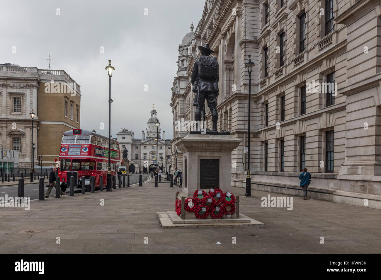 Wreaths on Ghurka Statue by Red Bus in London Stock Photo - Alamy