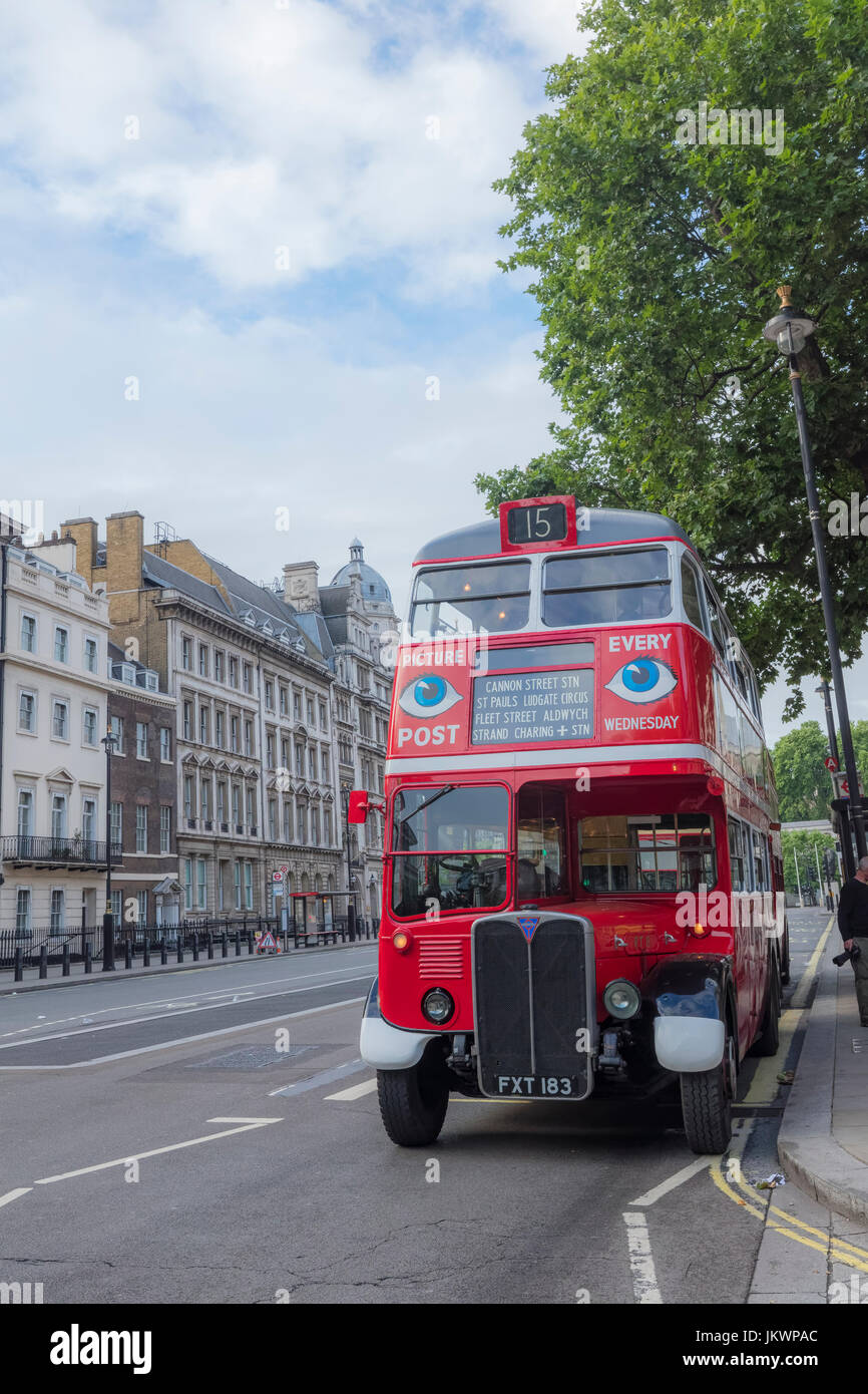 Red London Bus in Whitehall Stock Photo - Alamy