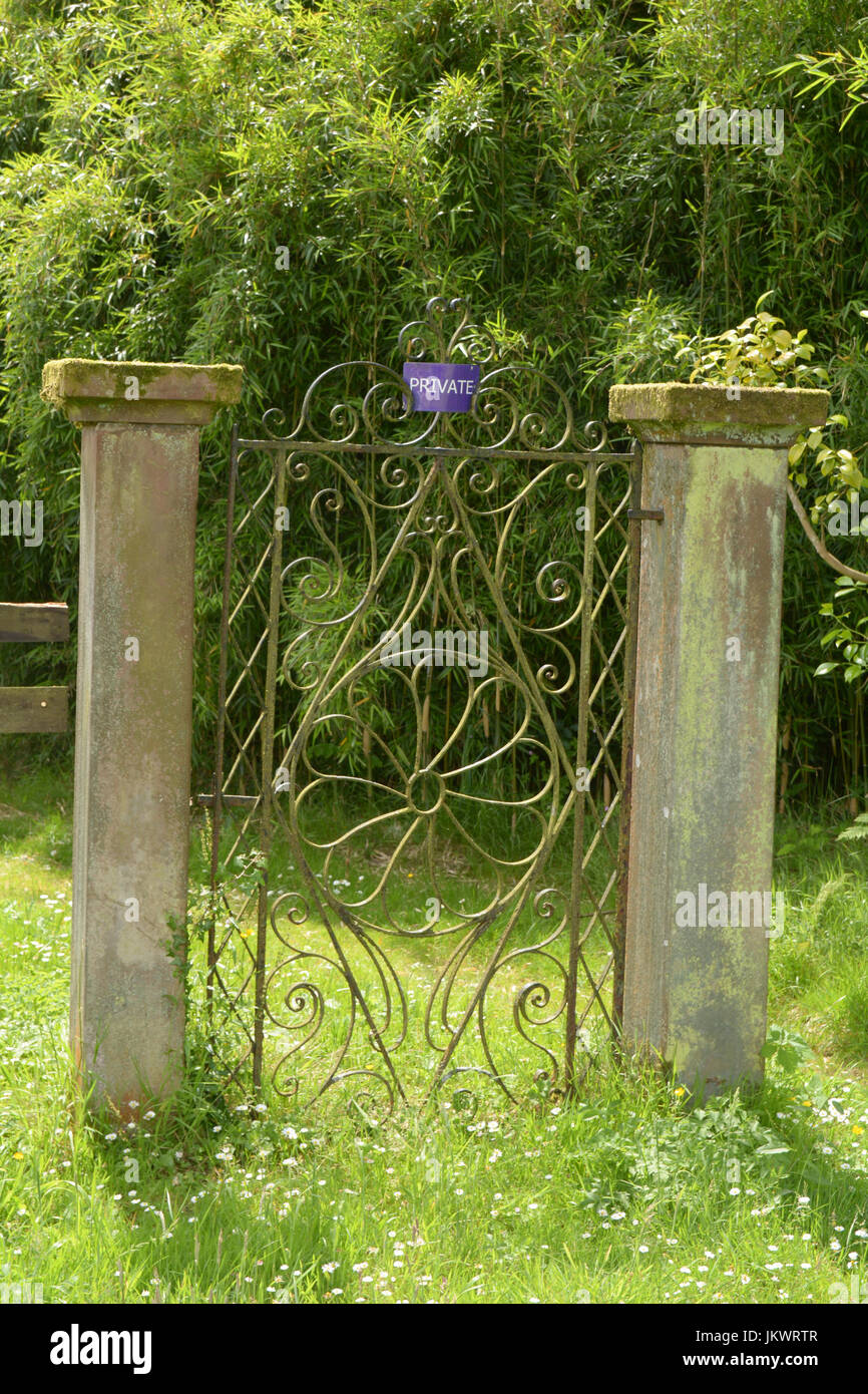 Private sign on iron gate Stock Photo - Alamy