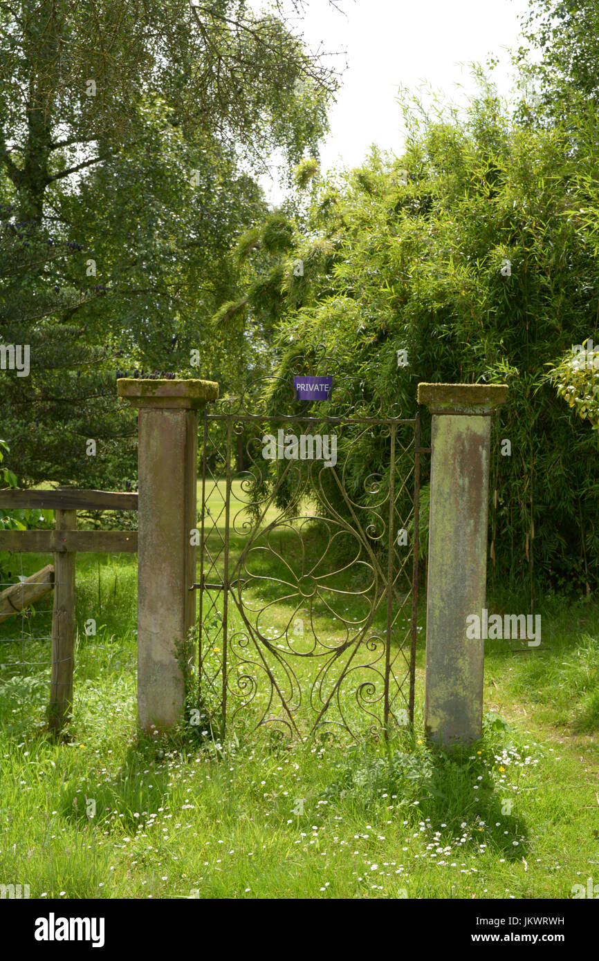 Private sign on iron gate Stock Photo - Alamy