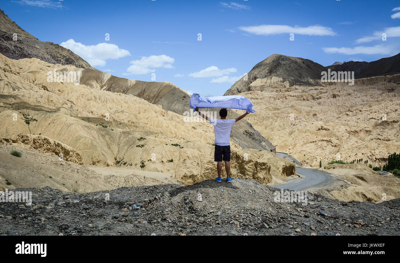 A man standing on mountain in Ladakh, India. Ladakh is the highest ...