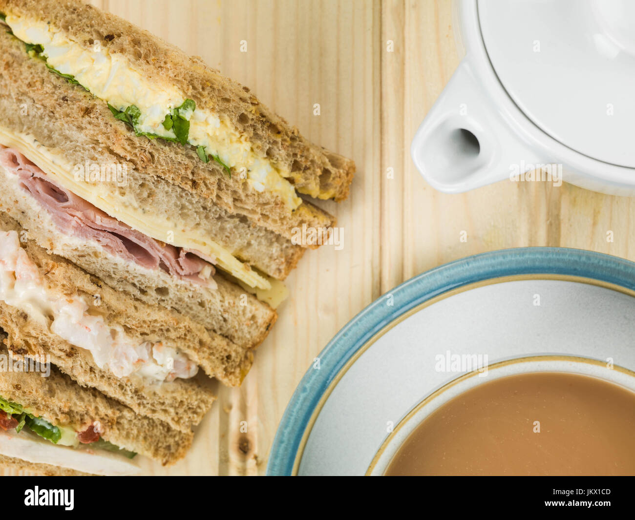 Selection of Assorted Sandwiches in Brown Bread With a Cup of Tea or ...