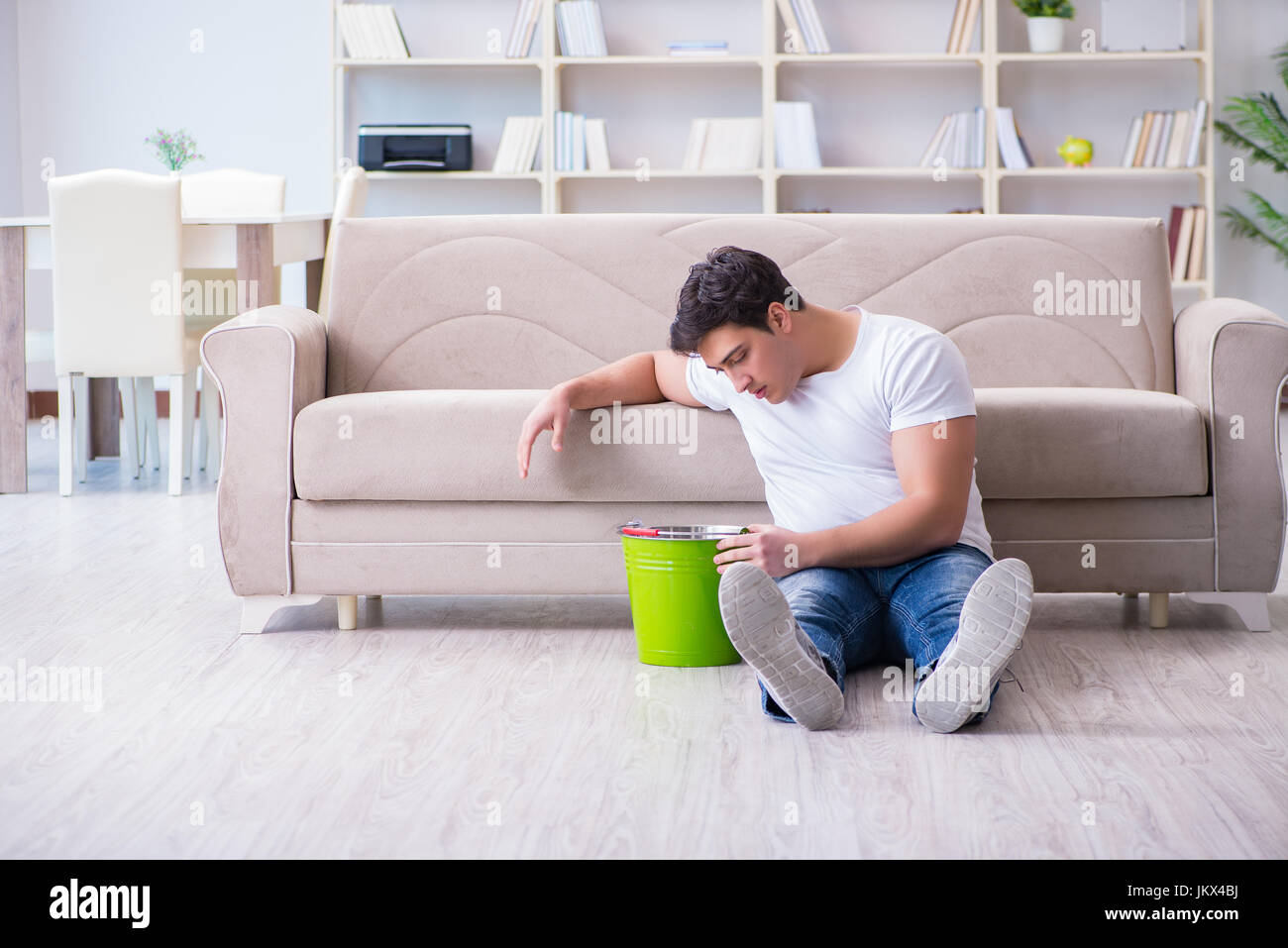 Man suffering from sick stomach and vomiting Stock Photo - Alamy