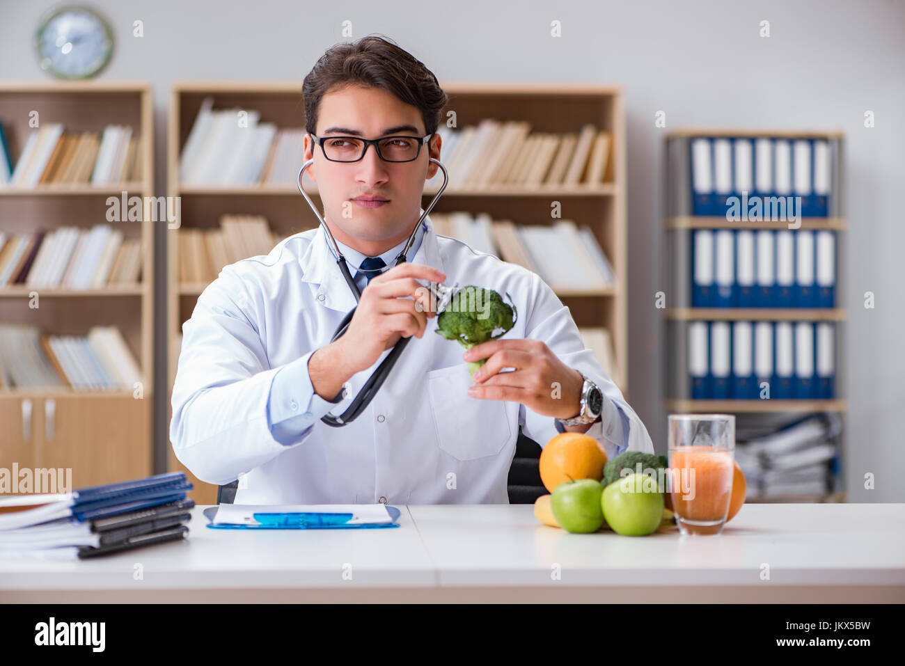 Scientist studying nutrition in various food Stock Photo - Alamy