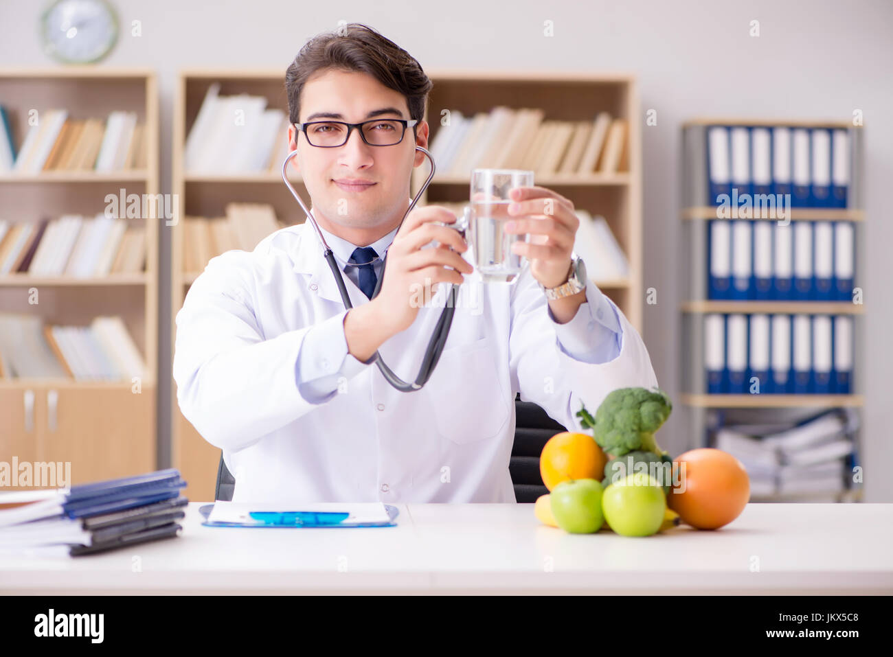 Scientist studying nutrition in various food Stock Photo - Alamy