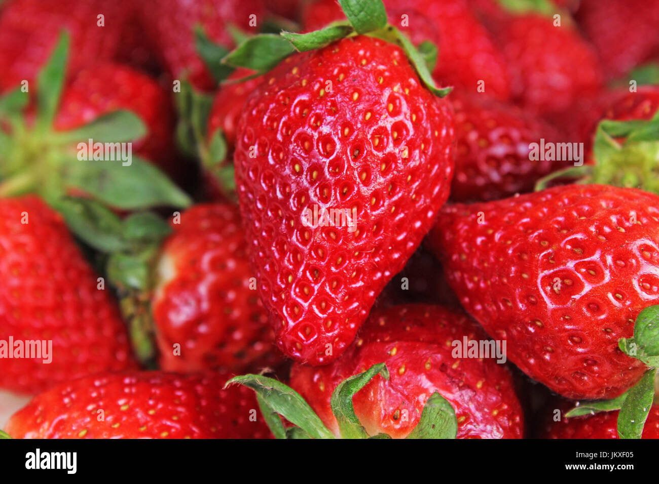Strawberry texture pattern closeup. Strawberries as background Stock ...