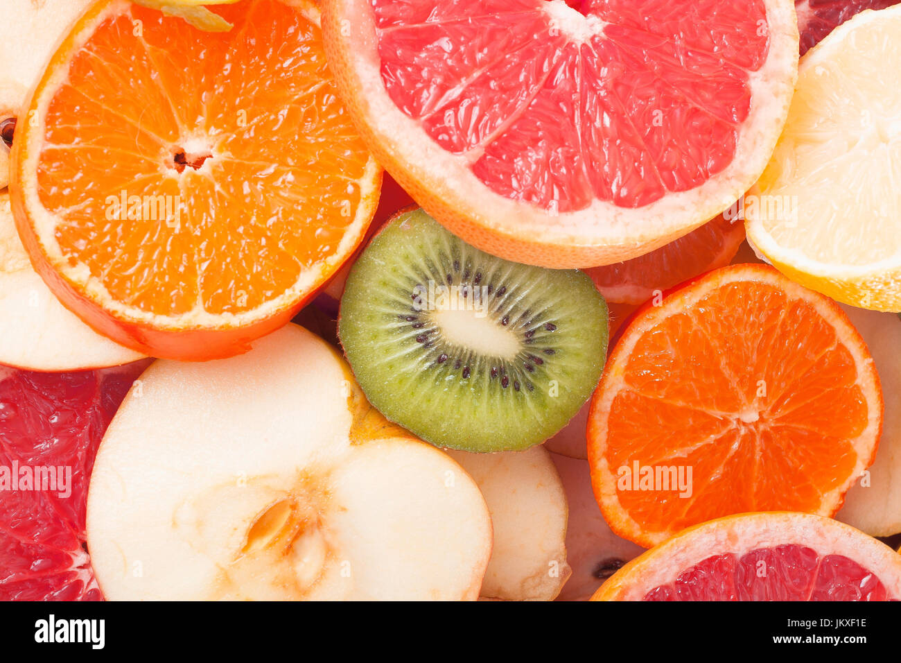 Half fruits fruit background Stock Photo - Alamy