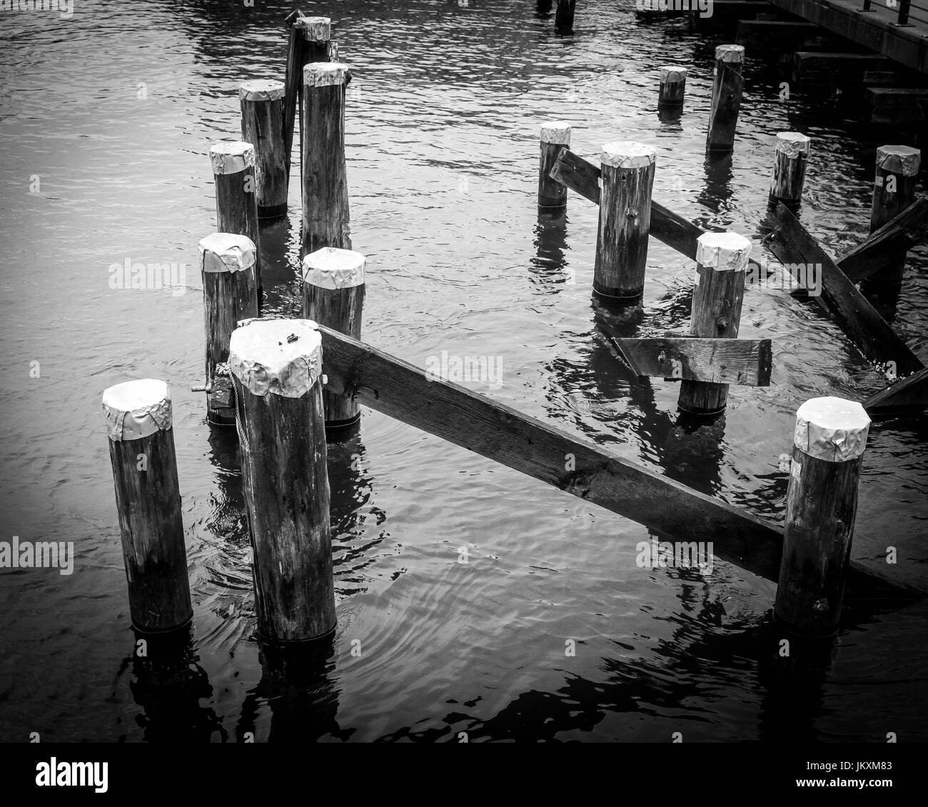 old dock posts Stock Photo - Alamy