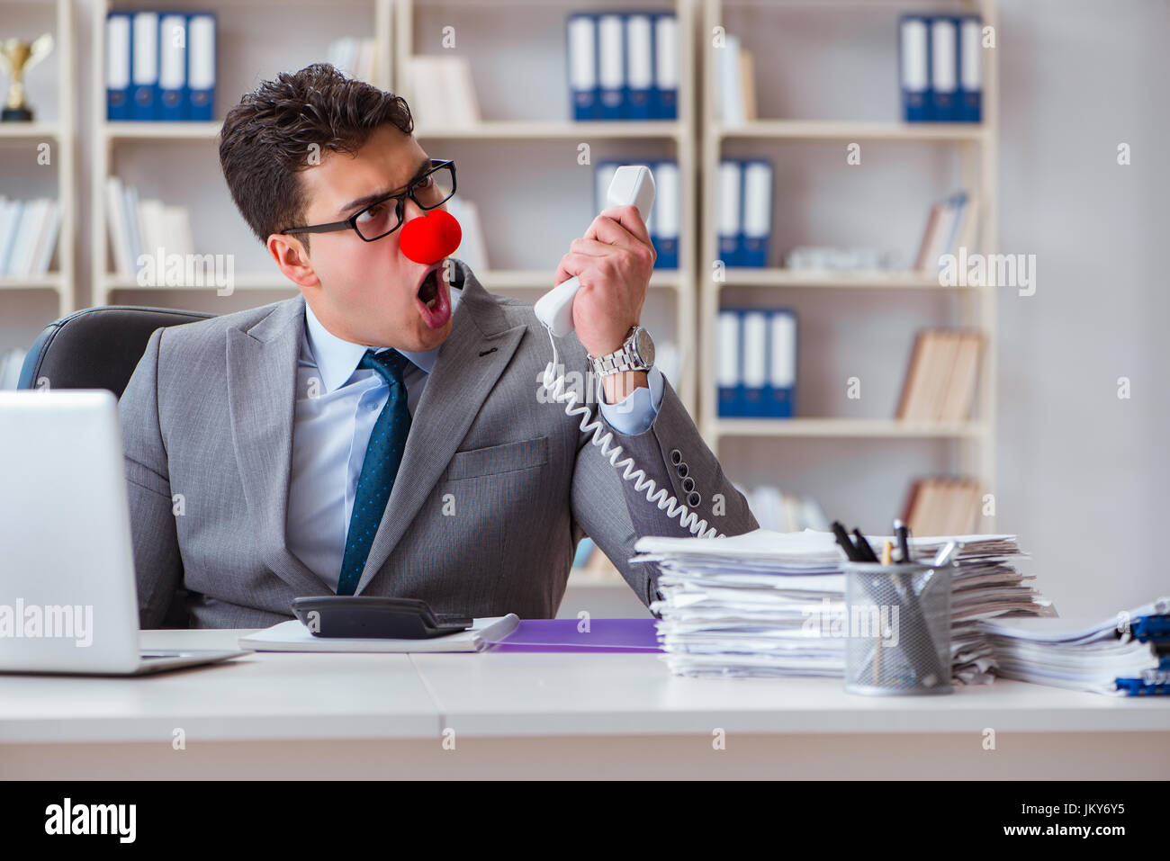 Clown businessman angry frustrated working in the office Stock Photo ...