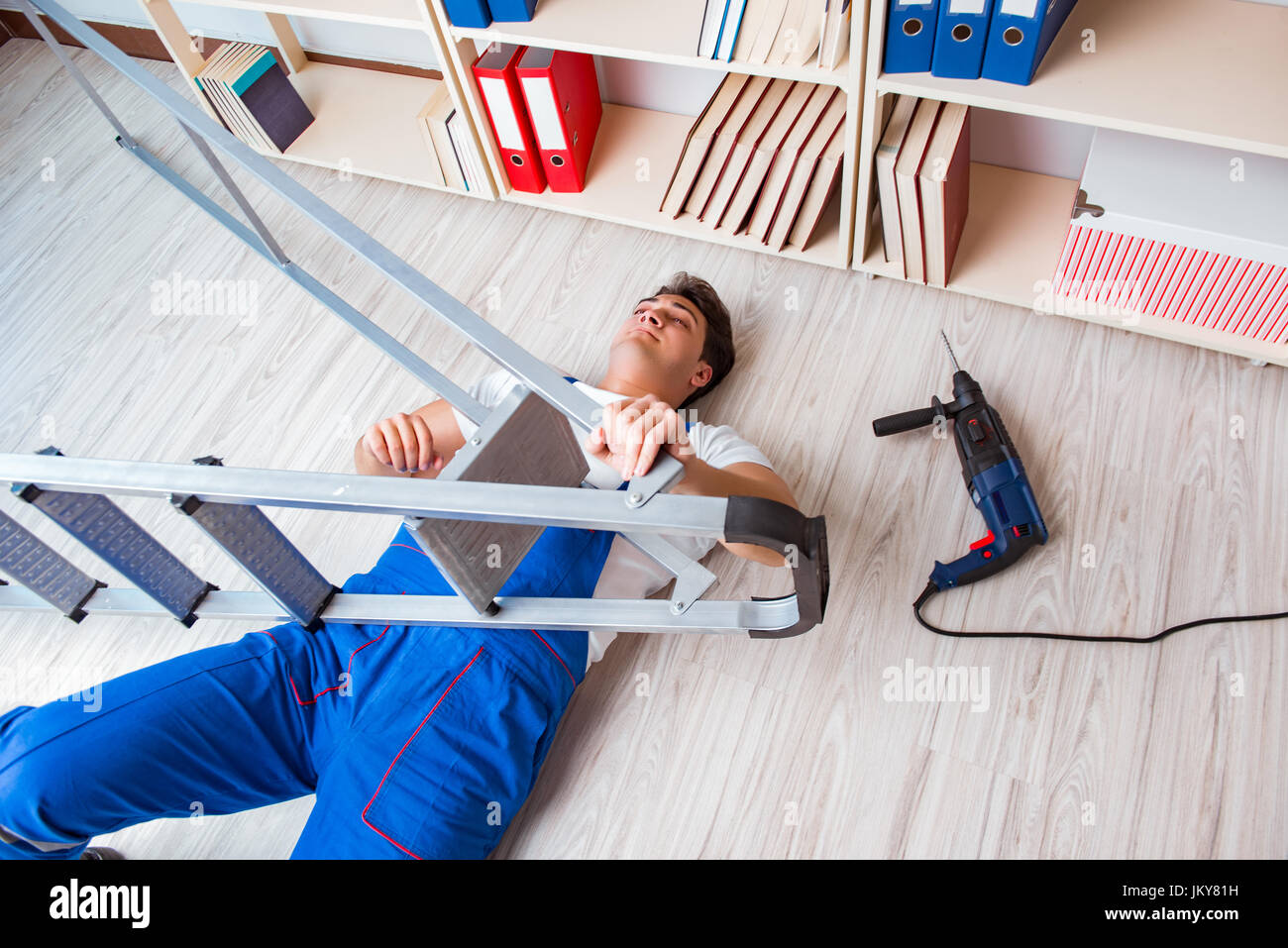 Unsafe behavior concept with falling worker Stock Photo - Alamy