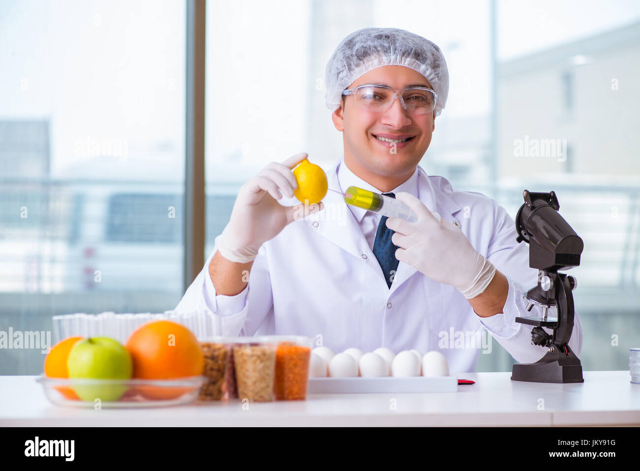 Nutrition expert testing food products in lab Stock Photo - Alamy