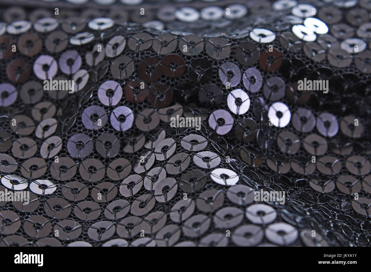 Black sequin texture. Black sequins as background Stock Photo - Alamy