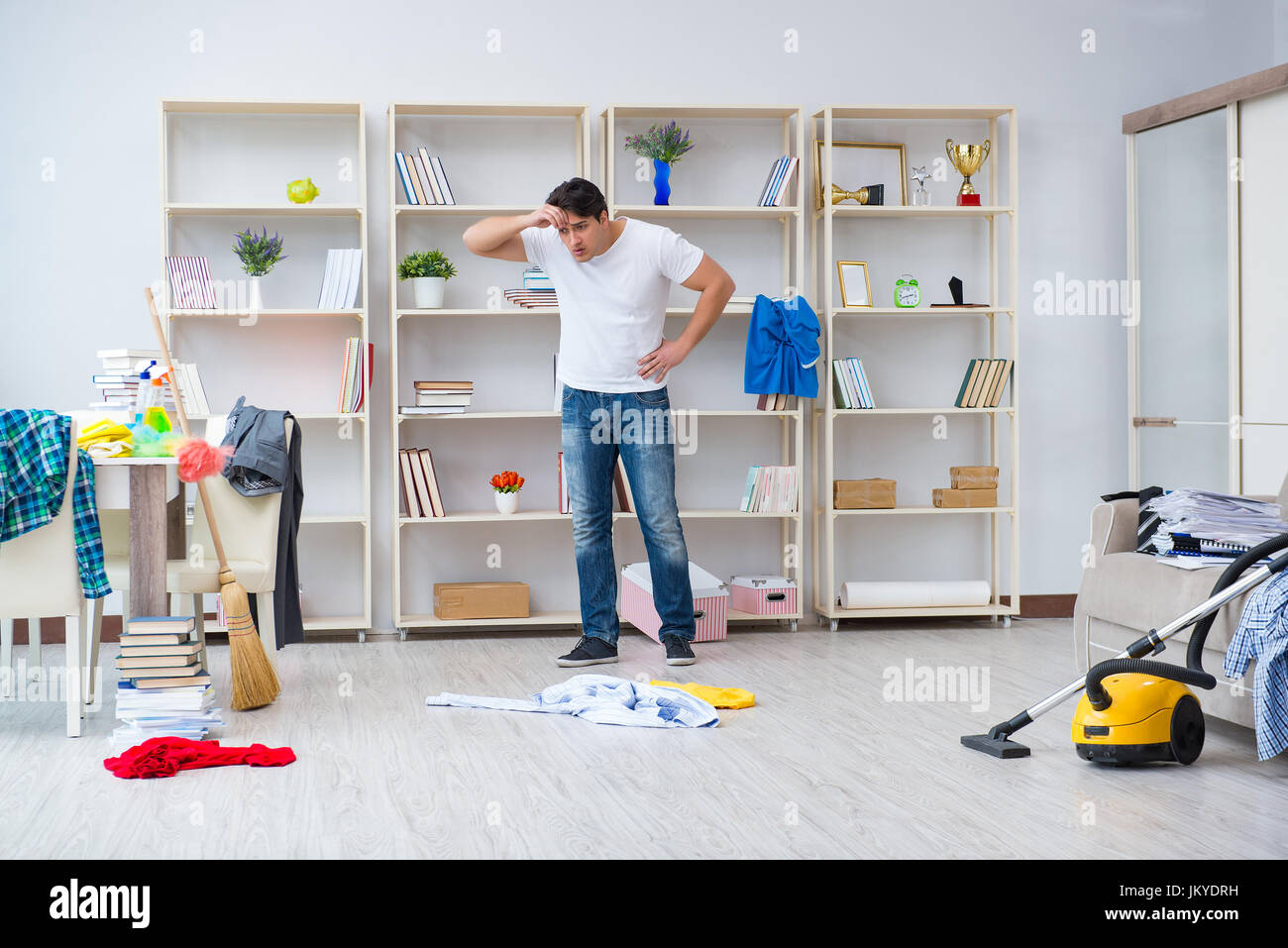 Man doing cleaning at home Stock Photo - Alamy